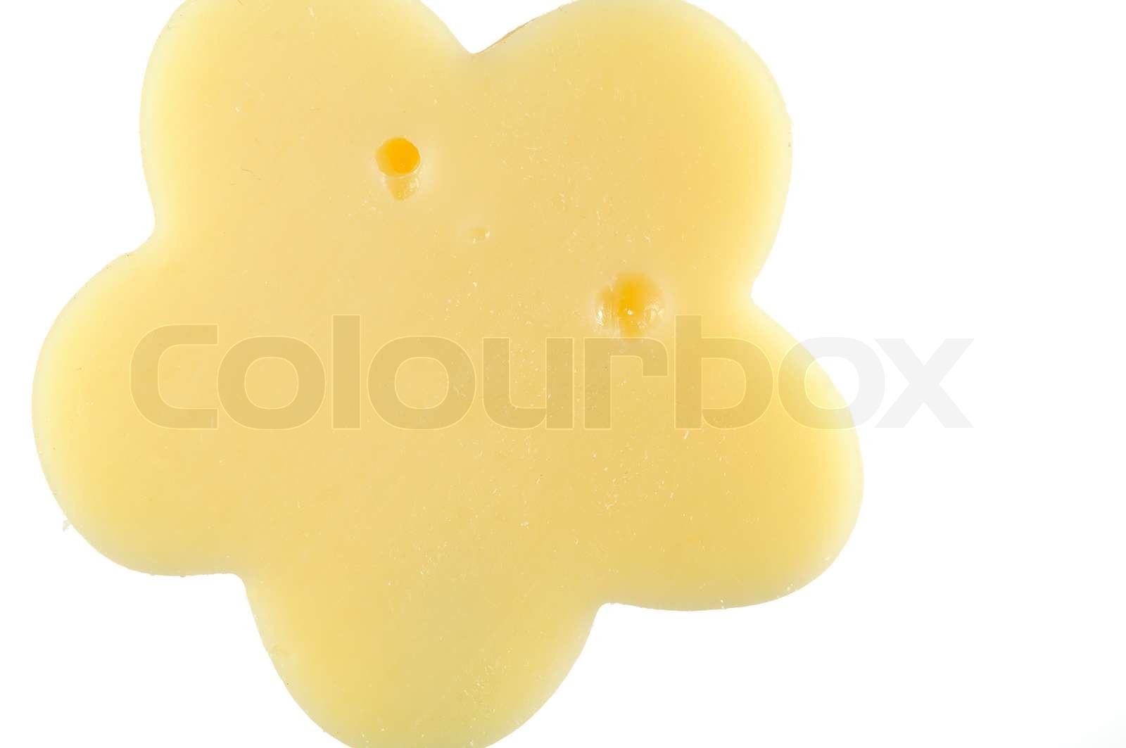 Flower-Shaped Piece of Cheese on White Background | Stock image | Colourbox