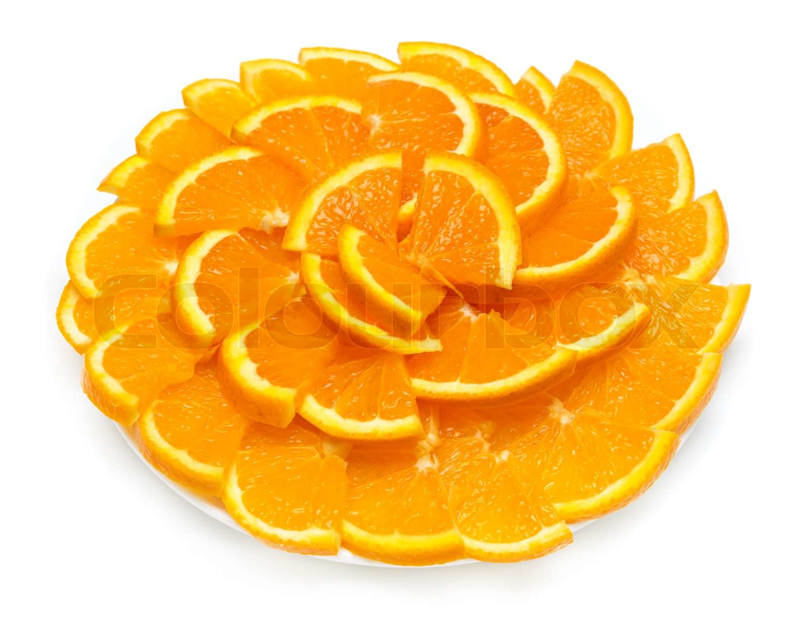 sliced oranges on a white background | Stock image | Colourbox