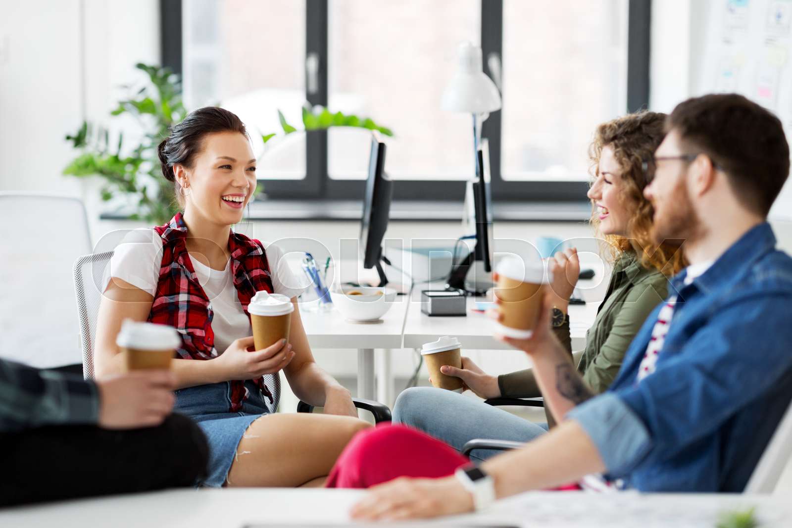 creative team drinking coffee at office | Stock image | Colourbox