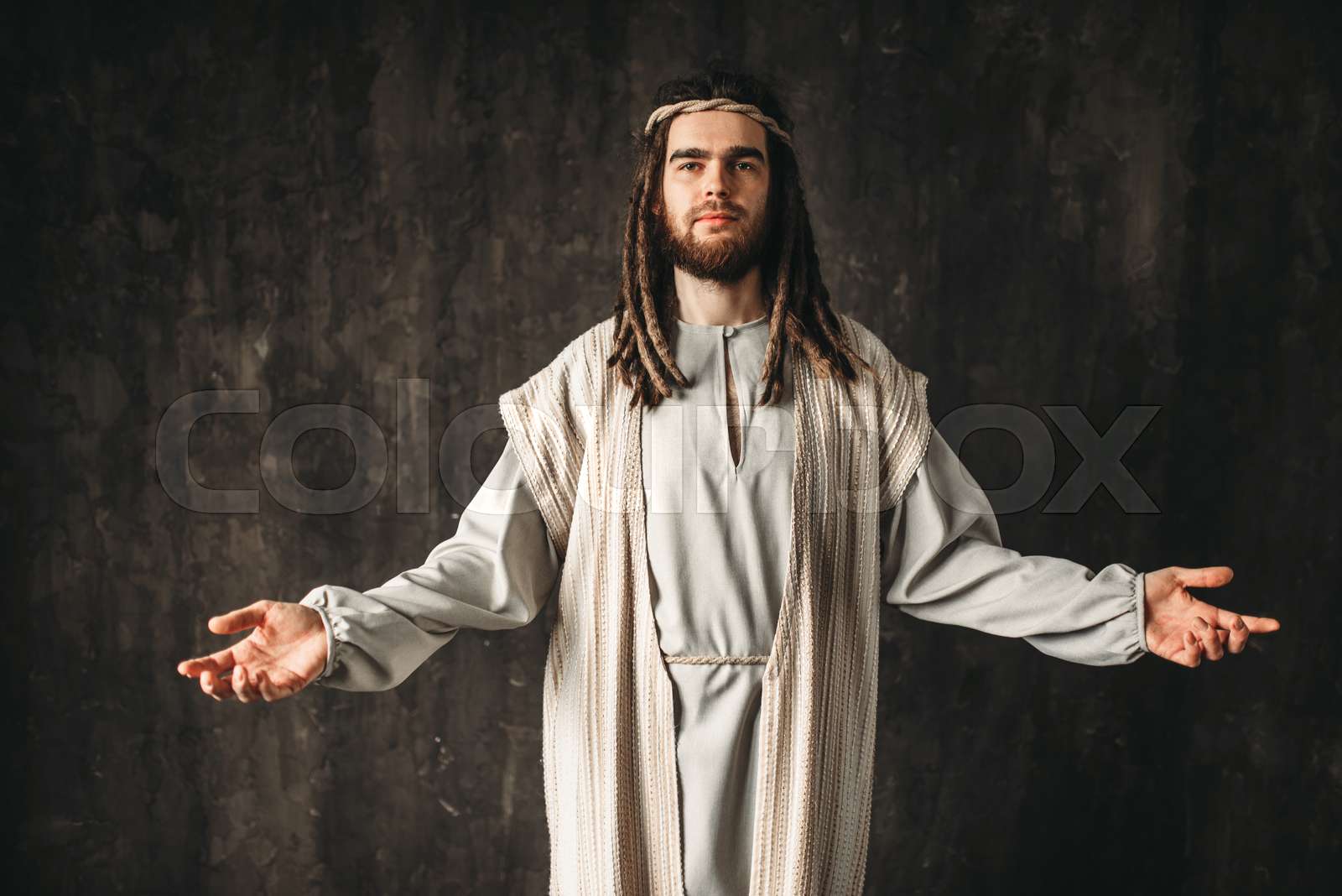 Jesus Christ praying with open arms | Stock image | Colourbox