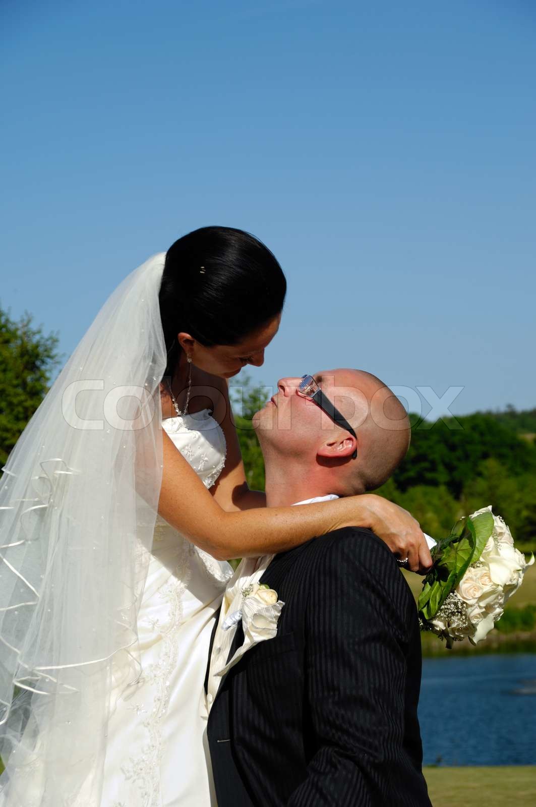 Bride and groom are about to kiss | Stock image | Colourbox