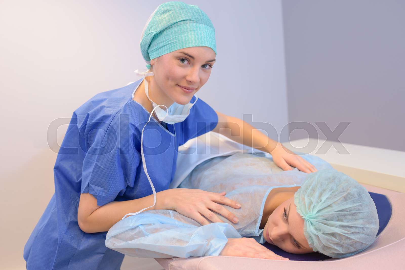 nurse relaxing patient | Stock image | Colourbox