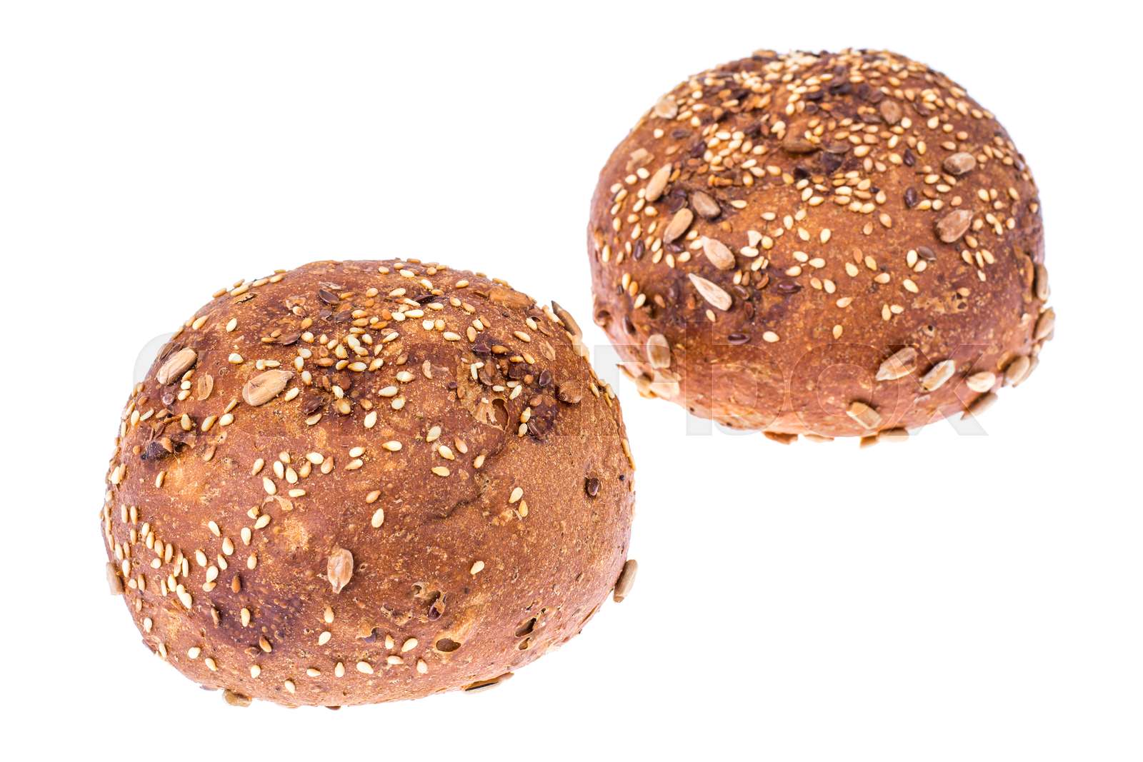 Round whole-wheat rye rolls with flax and sunflower seeds | Stock image ...