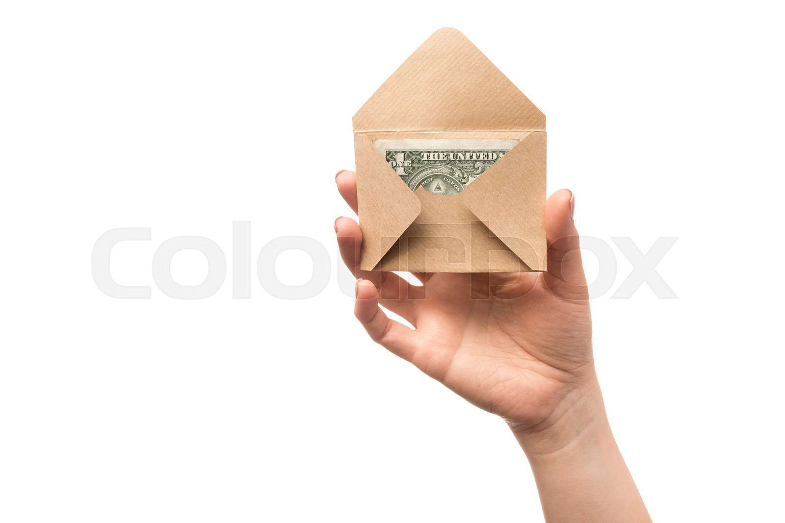An envelope with money in hand, isolated | Stock image | Colourbox