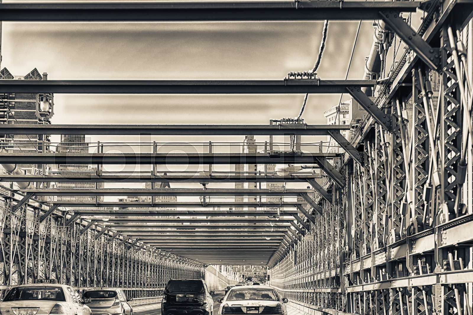 Cars crossing Brookly Bridge in New York. View from car interior ...