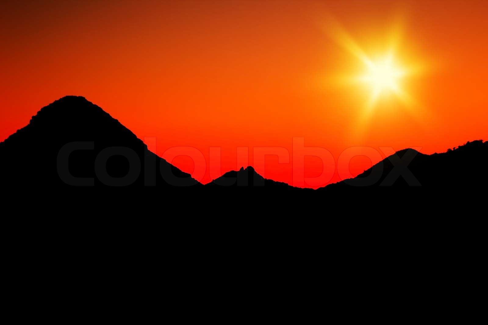 Warm mountains sunset with orange sky & silhouette of mountains | Stock ...