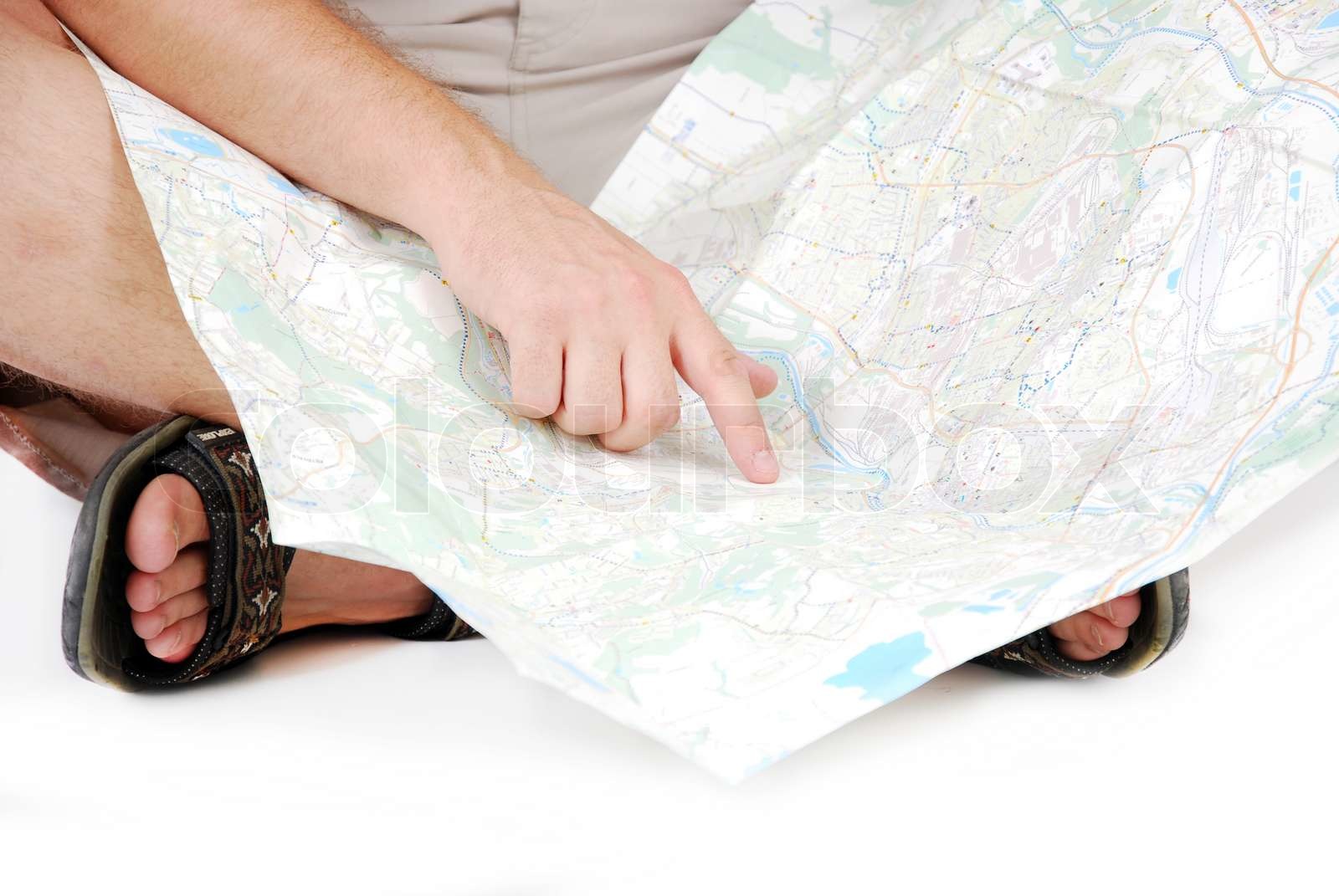 Lost man with map | Stock image | Colourbox
