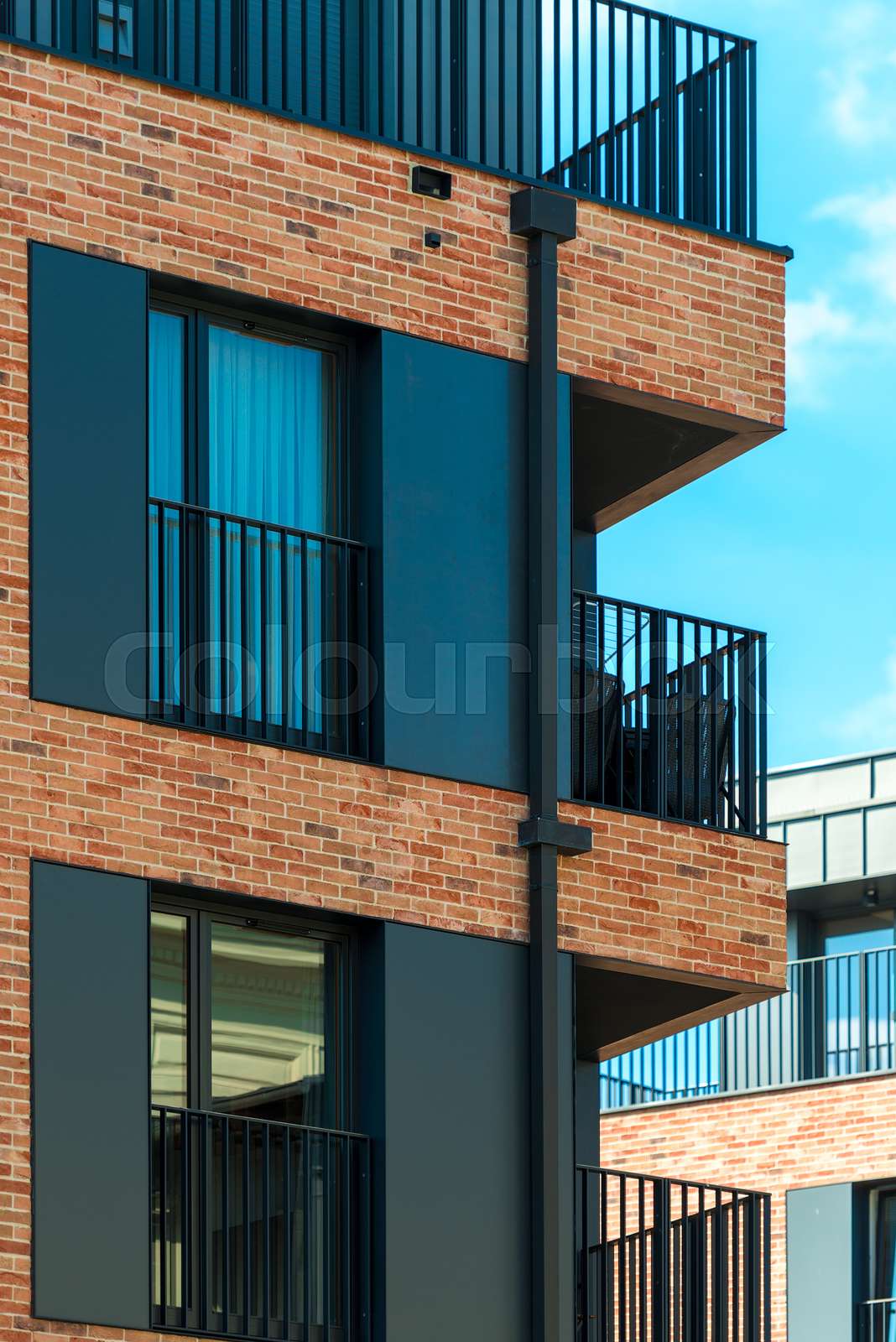 elements of a modern brick building - balconies and windows | Stock ...
