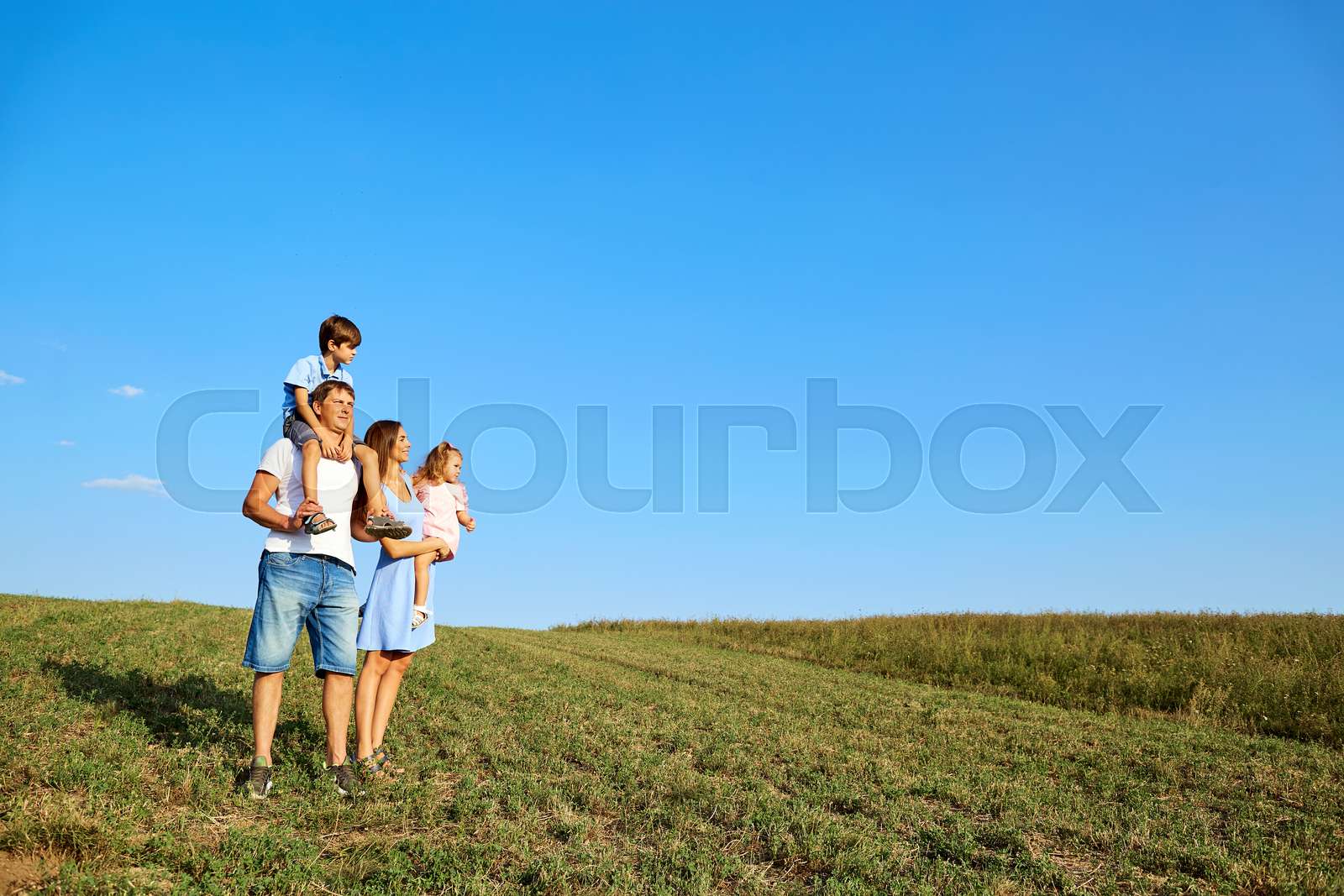 Happy family in nature. | Stock image | Colourbox