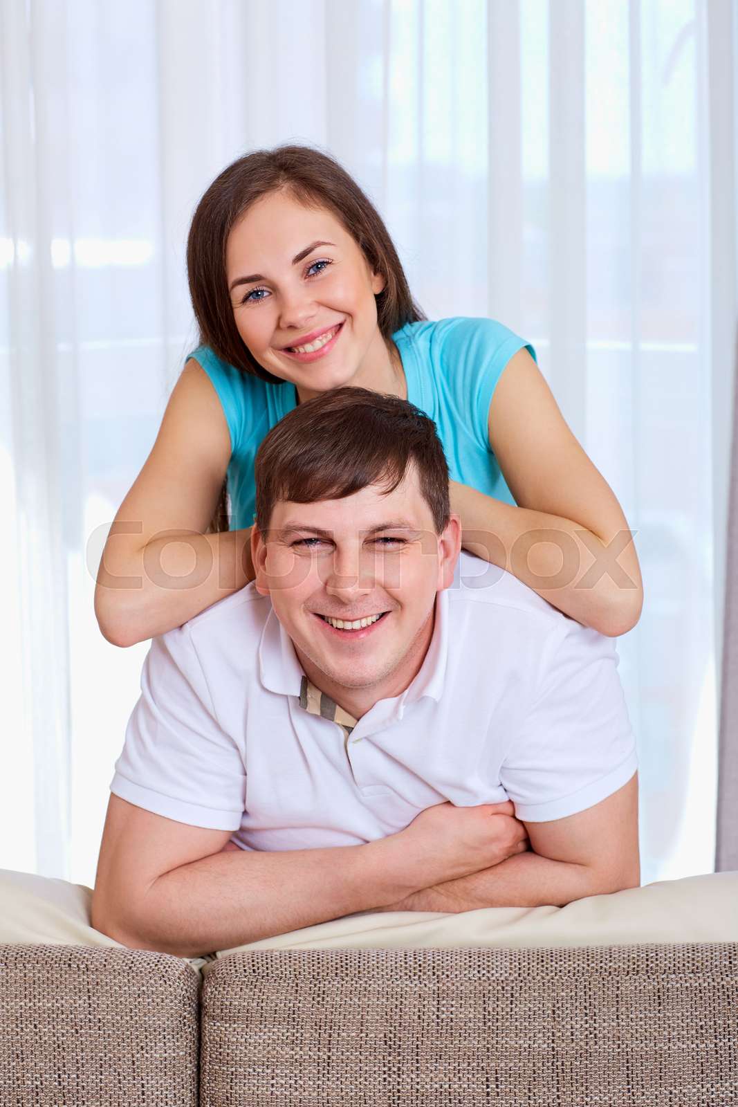 Portrait of happy and smiling husband and wife. Pyramid Pose. | Stock ...