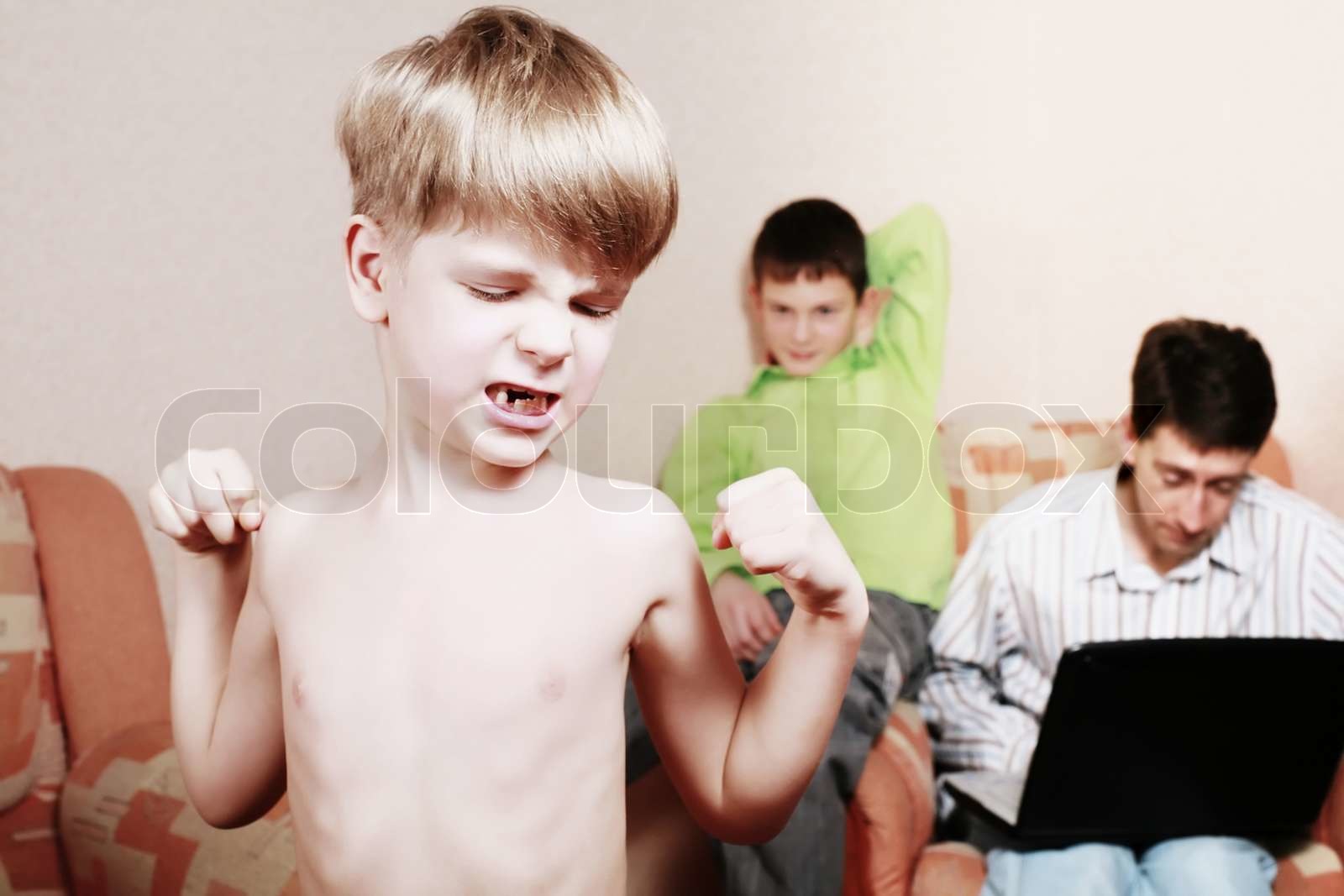 An image of a boy with his father and brother | Stock image | Colourbox