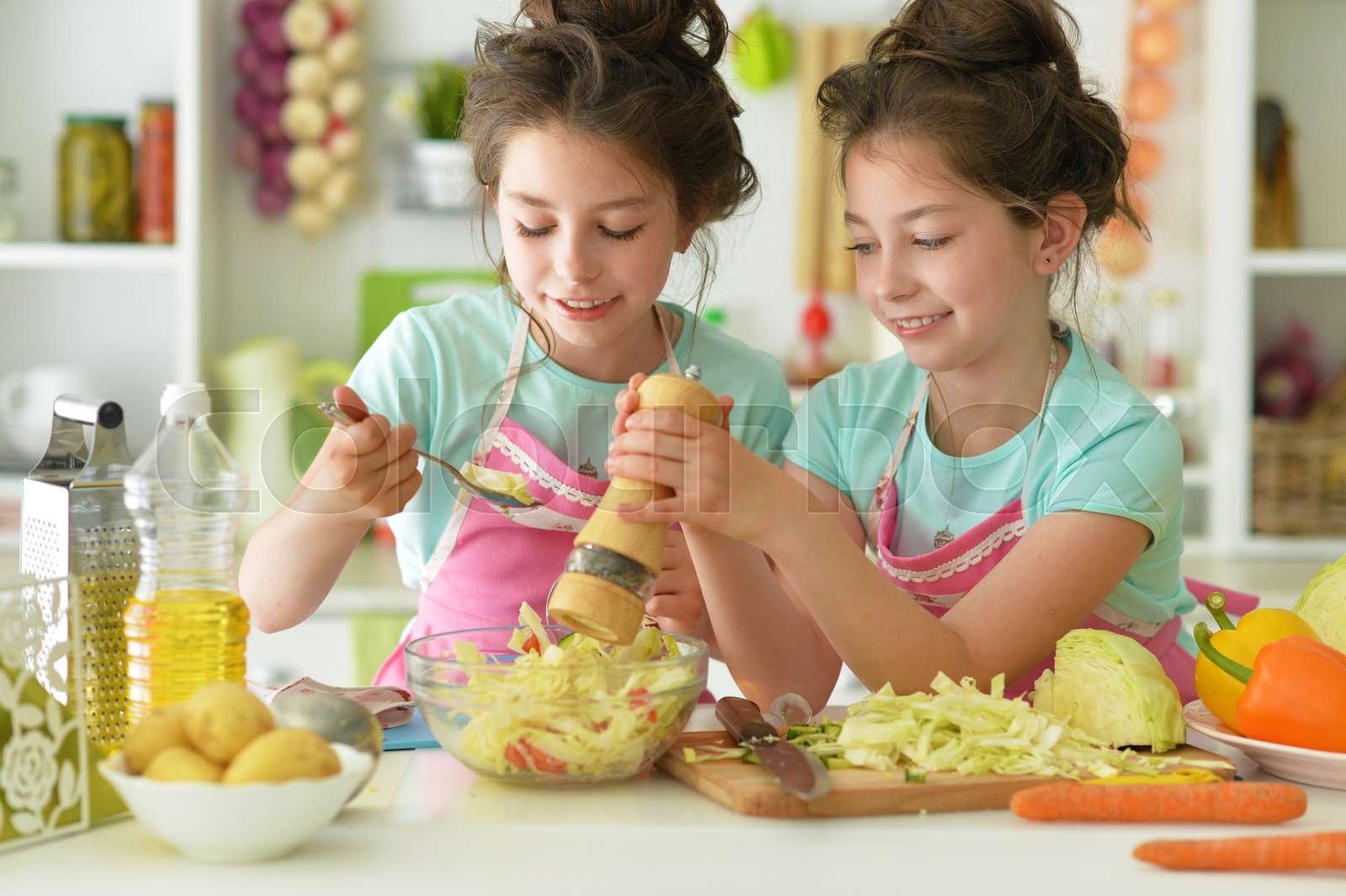 girls in the kitchen cook | Stock image | Colourbox
