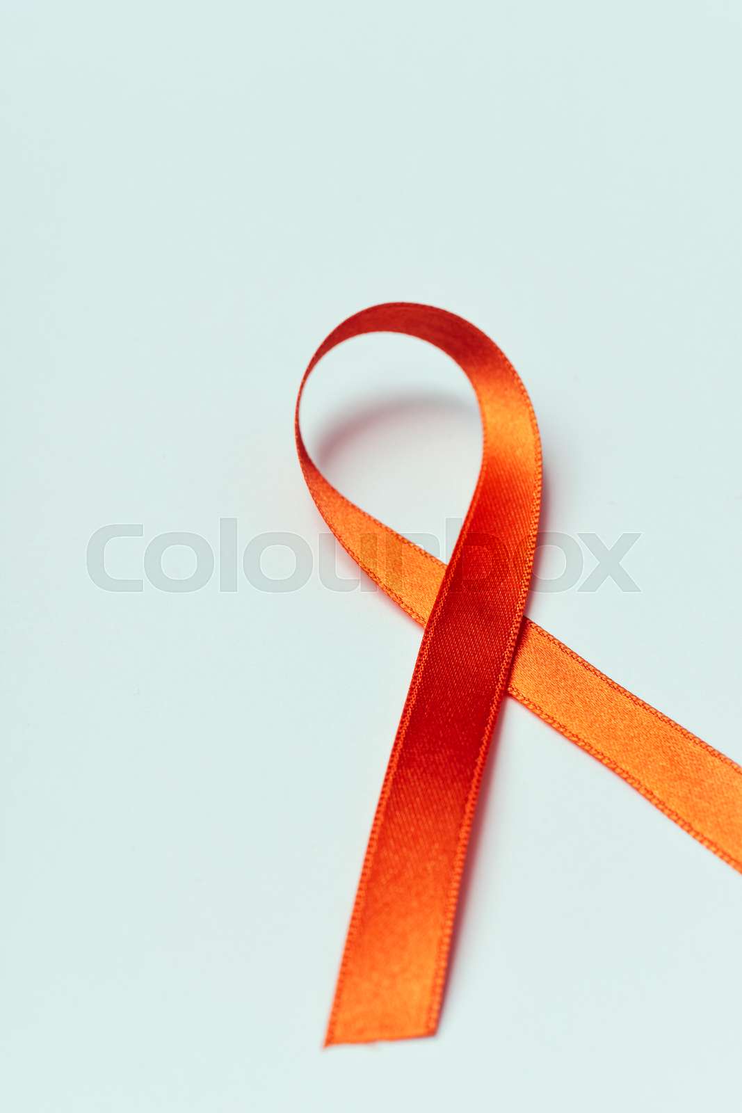 orange ribbon, for multiple sclerosis awareness | Stock image | Colourbox