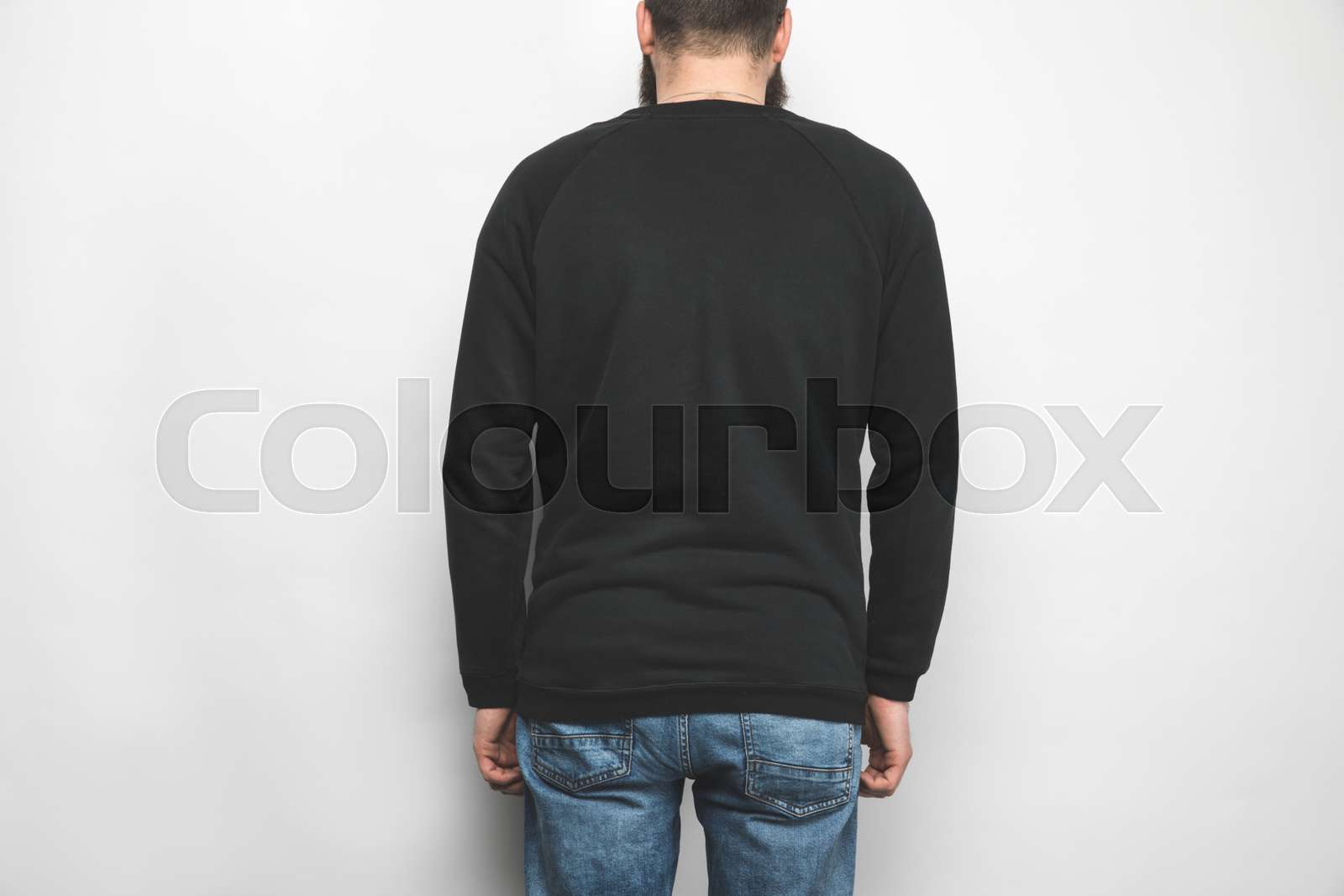 back view of man in black sweatshirt isolated on white | Stock image ...