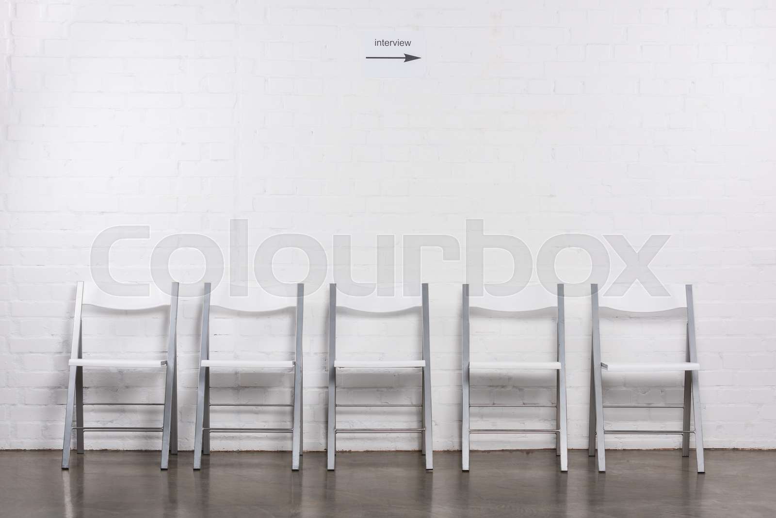 close up view of arranged empty chairs in hall for visitors of job ...