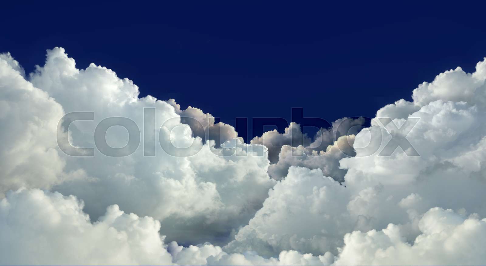 paradise sky with large clouds stacked as layers | Stock image | Colourbox