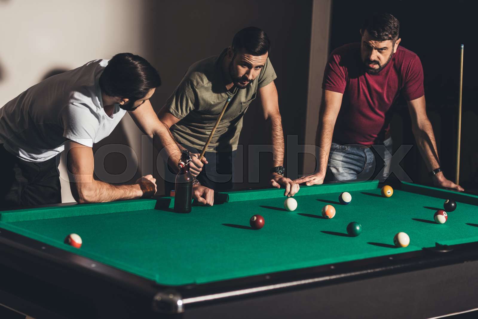 men playing in pool | Stock image | Colourbox