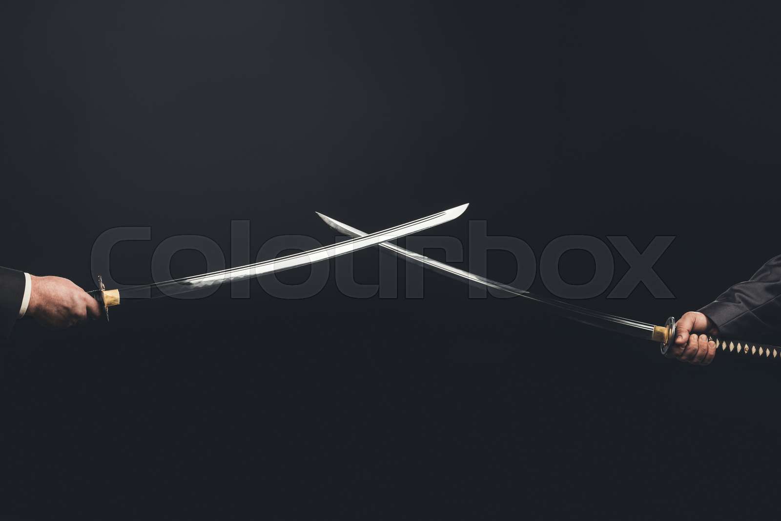 cropped shot of samurai with crossed swords isolated on black | Stock ...