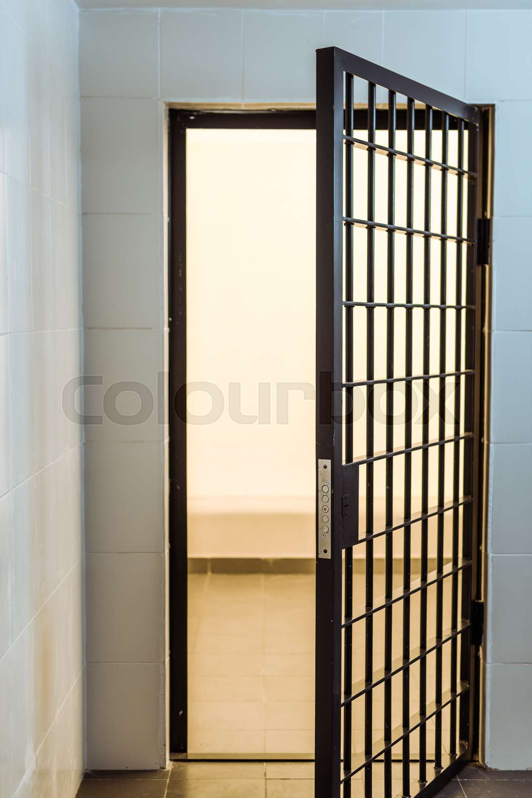 prison bars and empty prison room | Stock image | Colourbox