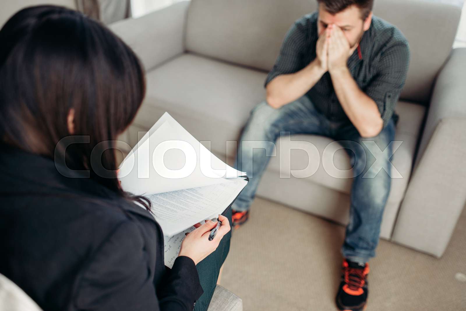 Sad patient at psychologist, psychology support | Stock image | Colourbox