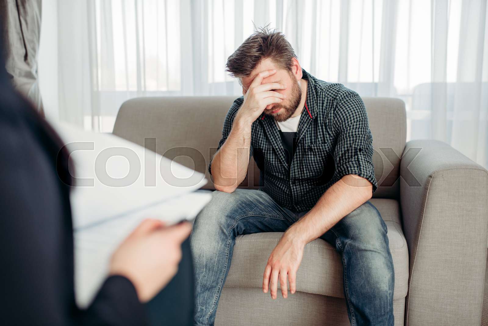 Sad patient at psychologist, psychology support | Stock image | Colourbox