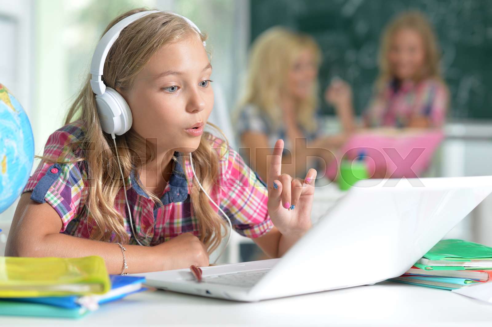 beautiful little girl at classroom | Stock image | Colourbox