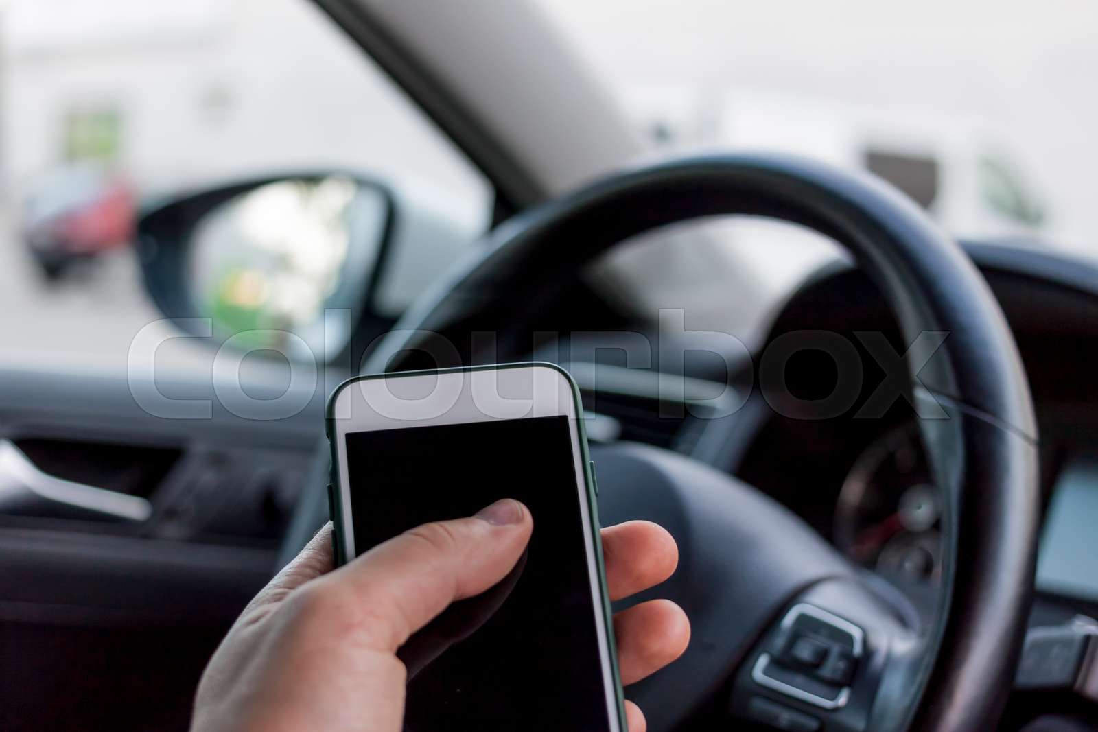 use of smart phone in car | Stock image | Colourbox
