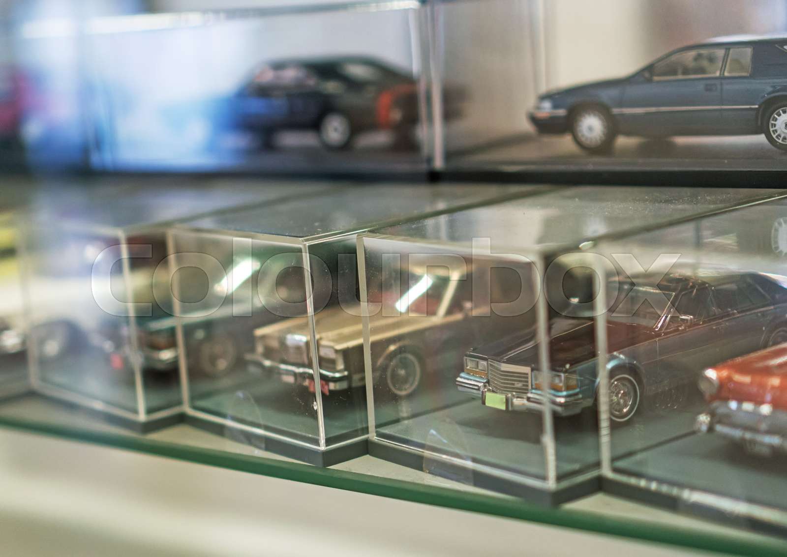 Collection of retro toy car models in shop window. | Stock image ...