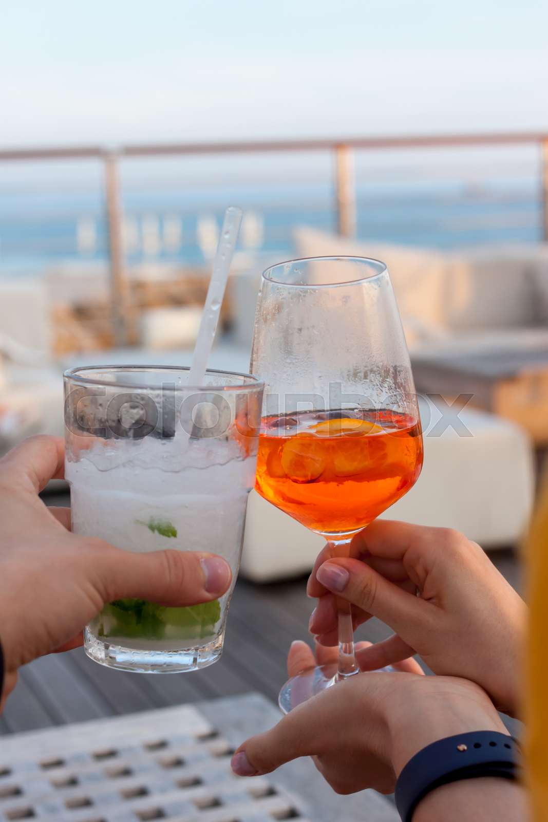 cheers two glasses with cocktails | Stock image | Colourbox