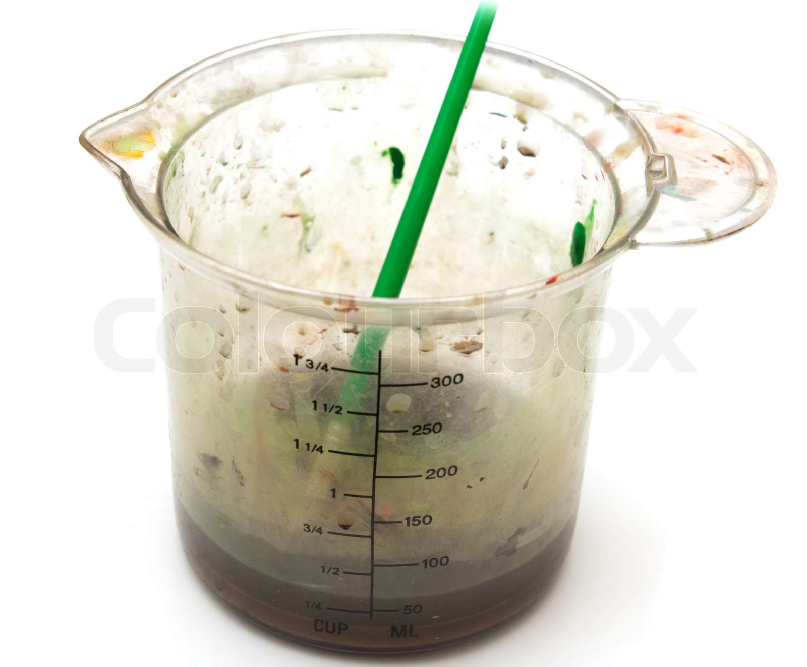 a glass of dirty water under the paint | Stock image | Colourbox
