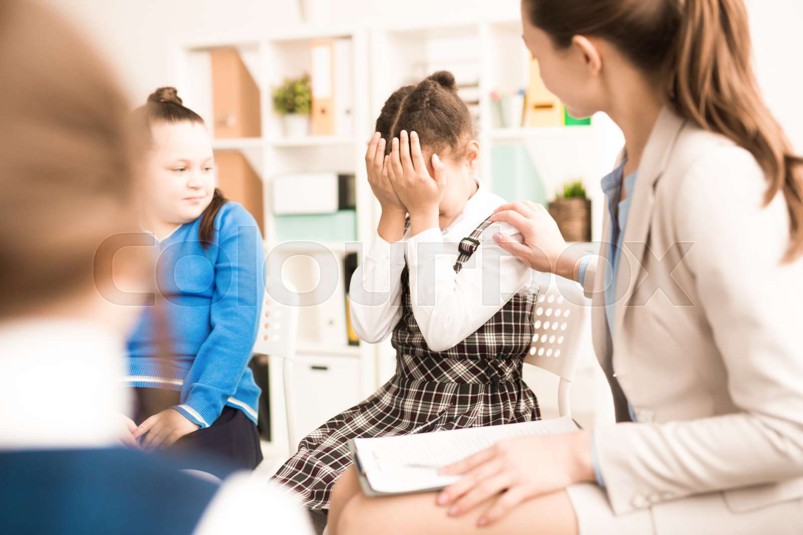 Schoolgirl crying | Stock image | Colourbox