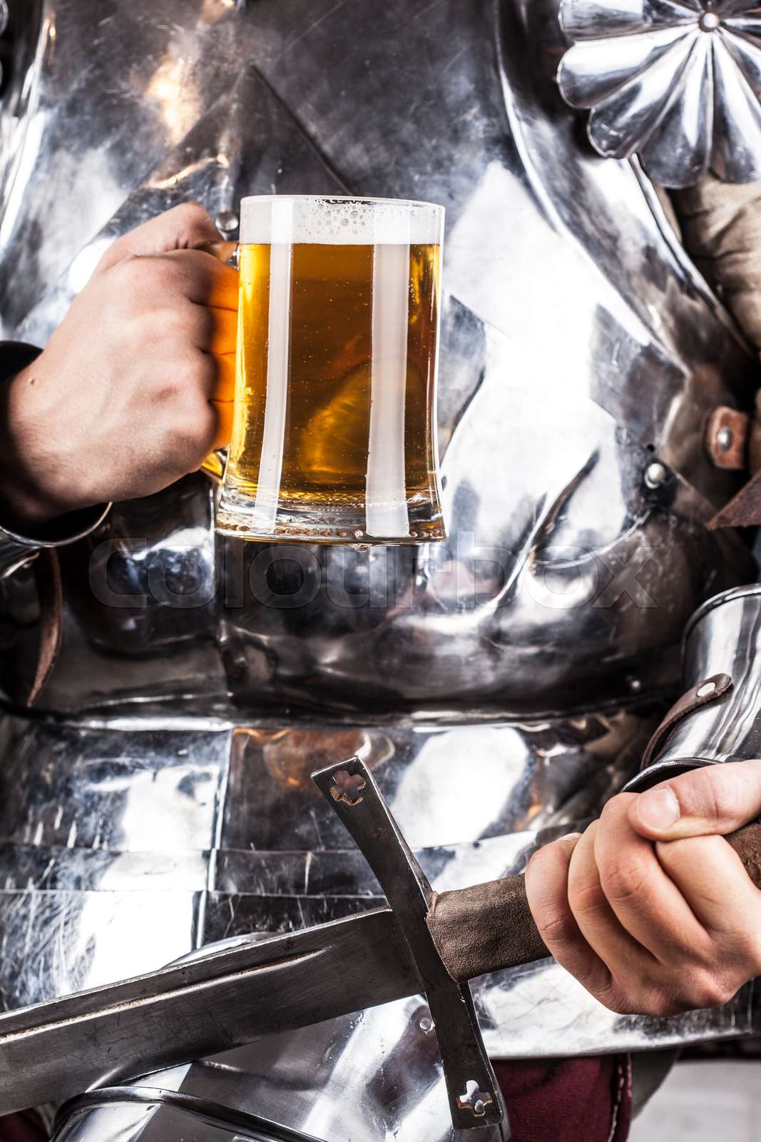 knight wearing armor and holding mug of beer and two-handed sword ...