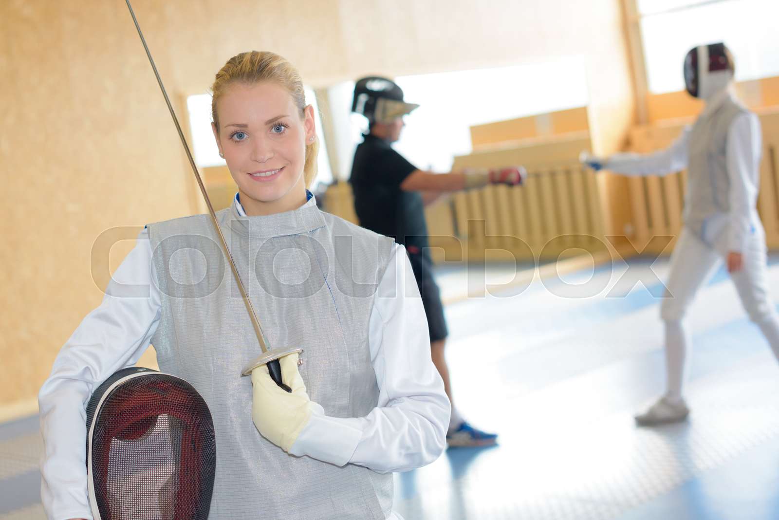 Portrait of female fencer | Stock image | Colourbox
