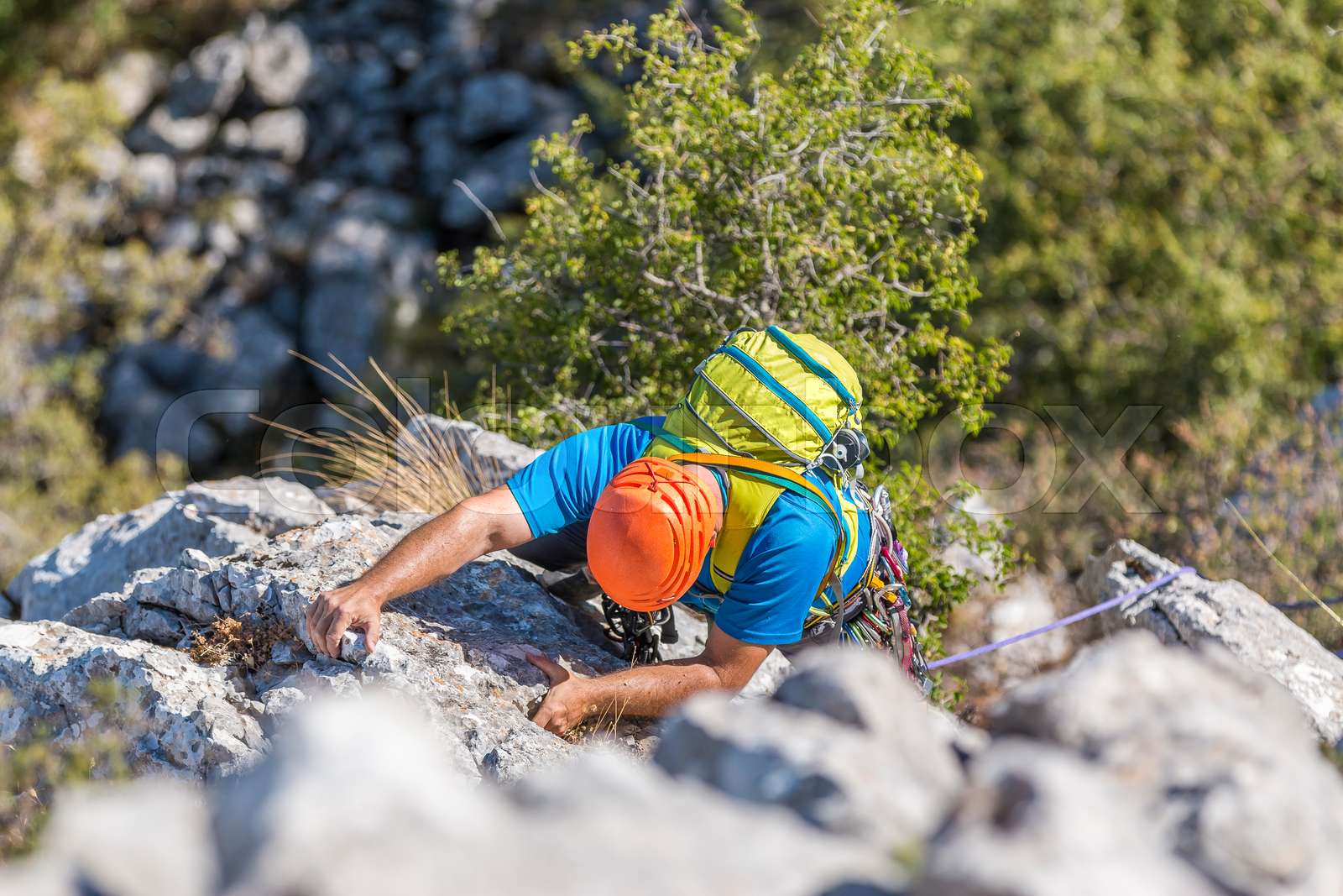 Explorer climbing on mountain | Stock image | Colourbox