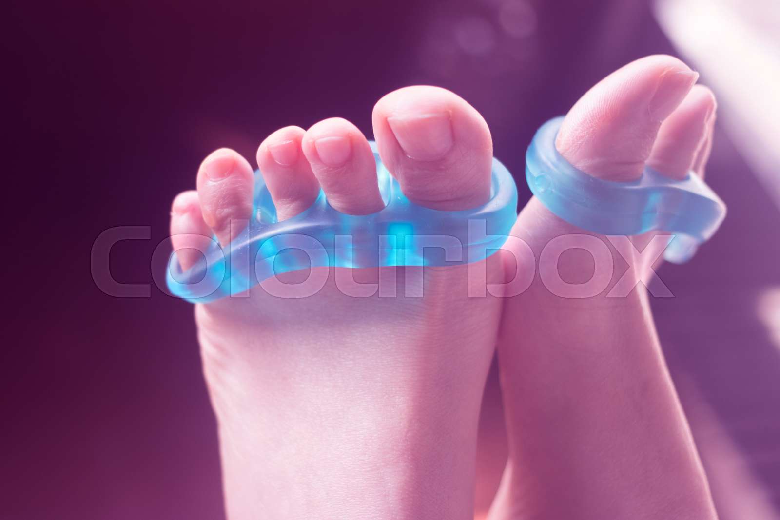 Toe separator to pedicure nails | Stock image | Colourbox