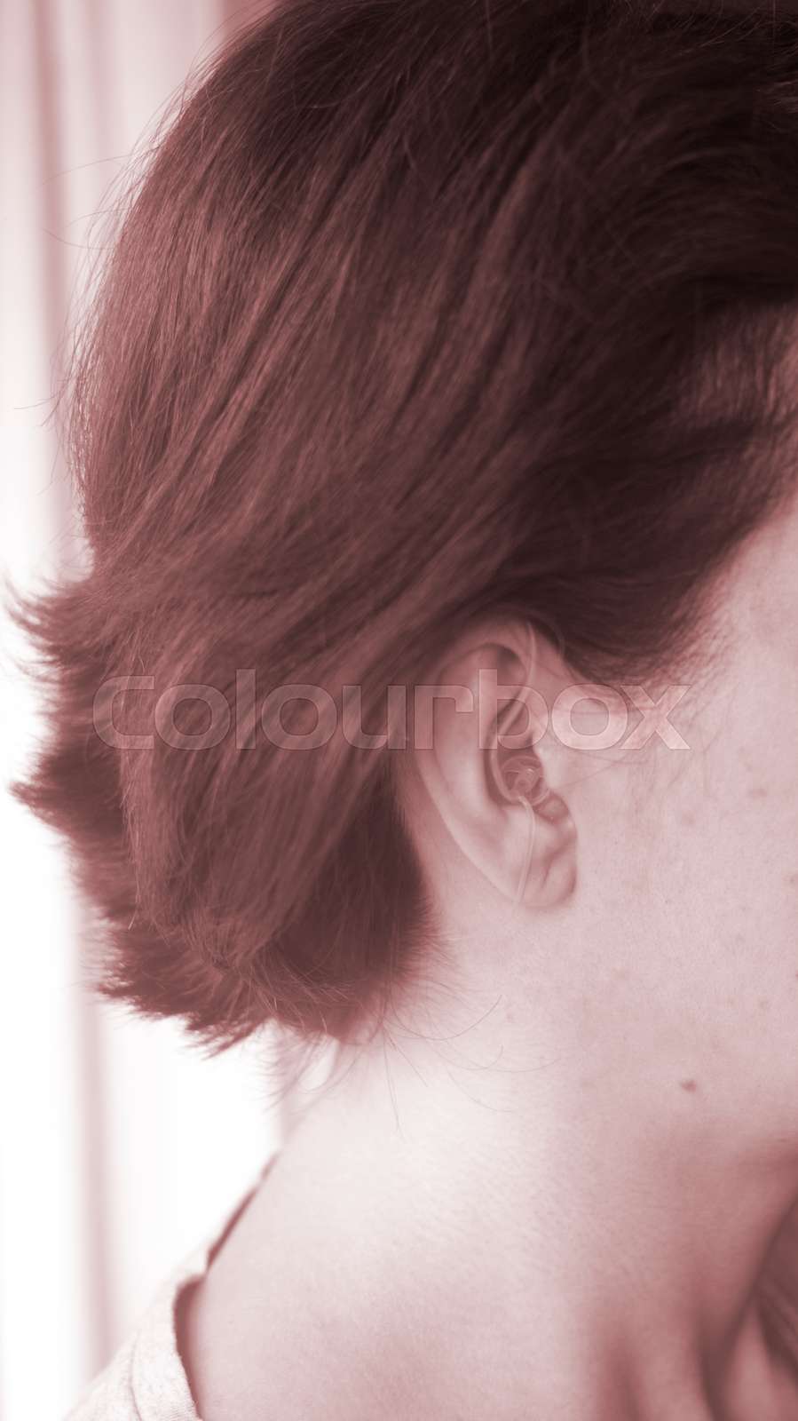 Deaf woman hearing aid ear | Stock image | Colourbox