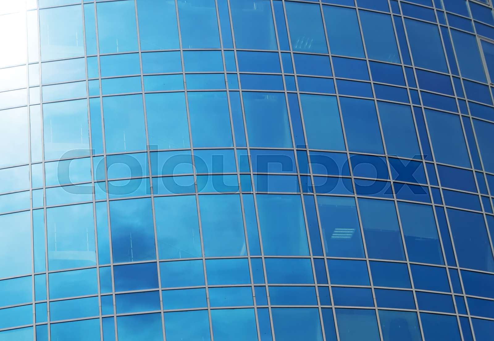 Modern round office building with square windows. | Stock image | Colourbox