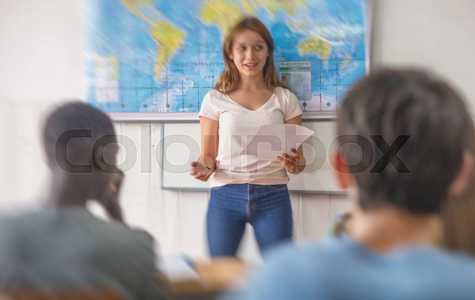 School girl interviewed in the classroom | Stock image | Colourbox