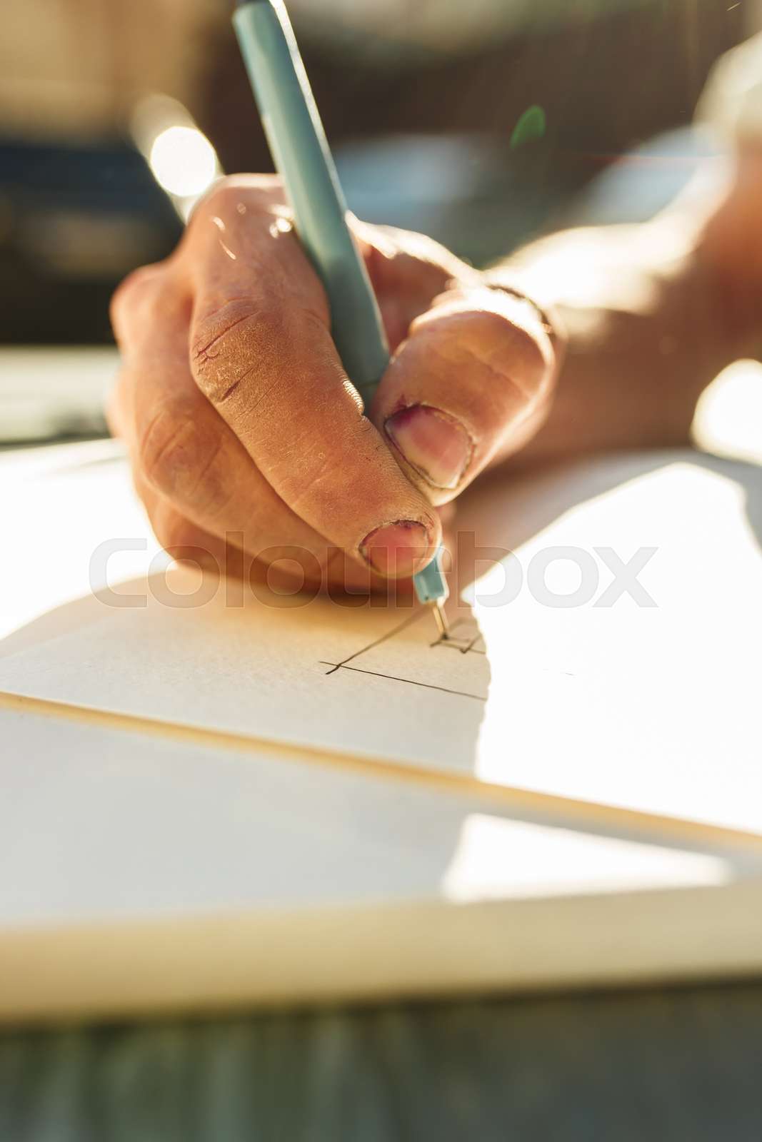 Close up man working of Architect sketching a construction project on ...