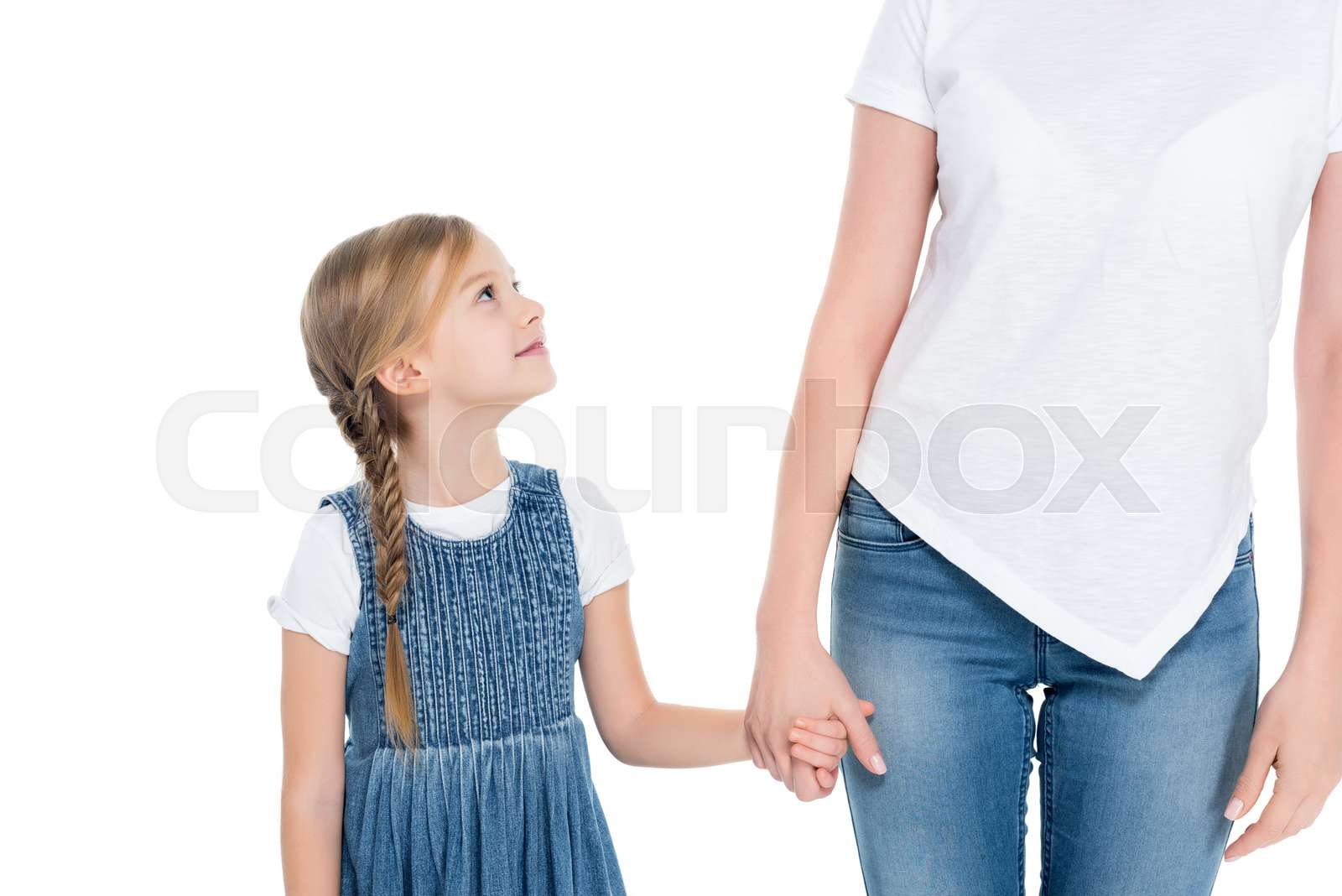 adorable daughter holding hands with mother, isolated on white | Stock ...