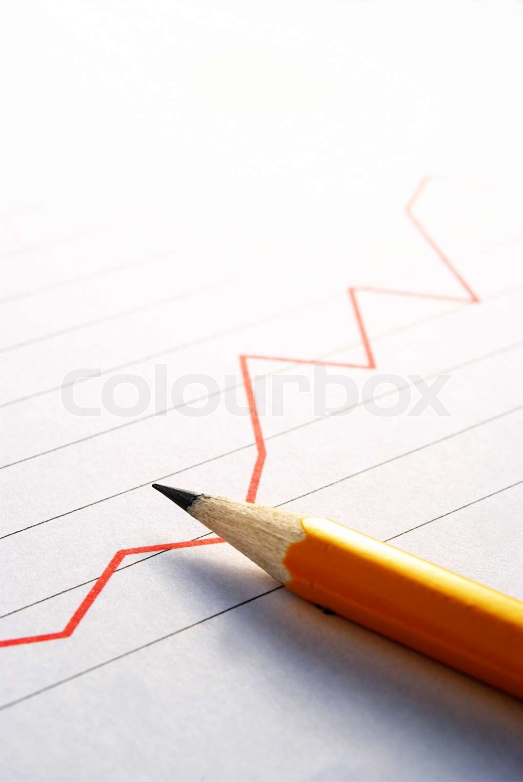 blyant og rød linje tegning på et papirark | Stock foto | Colourbox