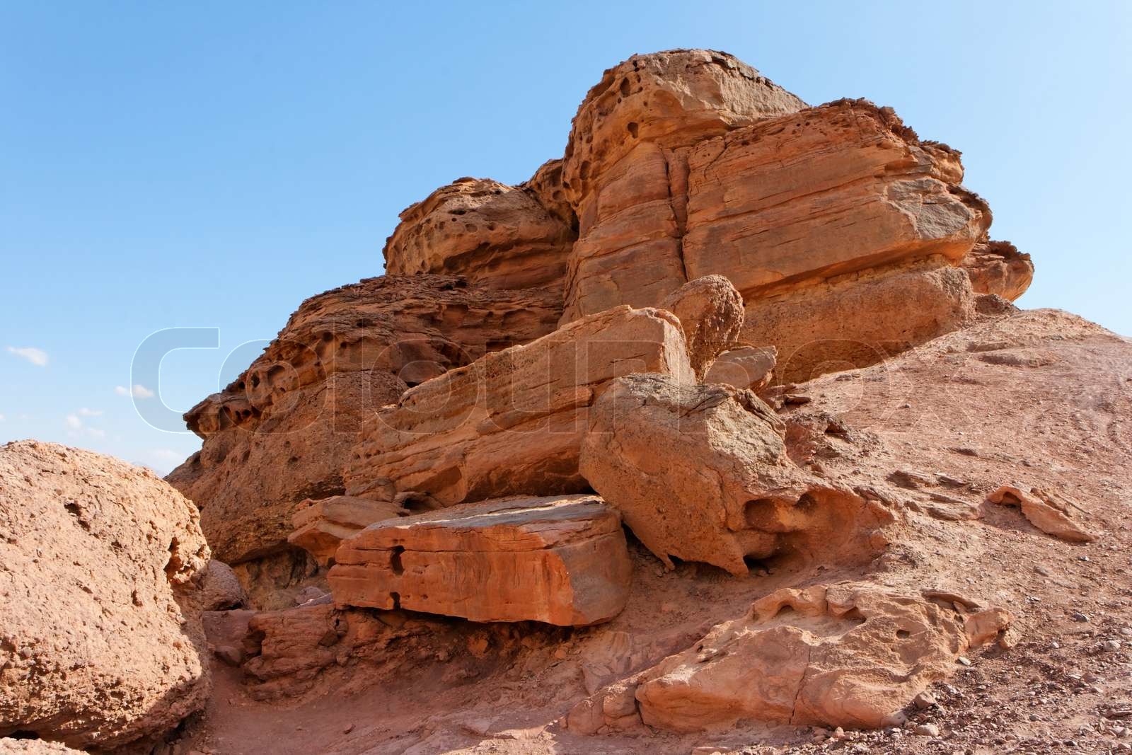 Scenic weathered orange rock in stone desert | Stock image | Colourbox