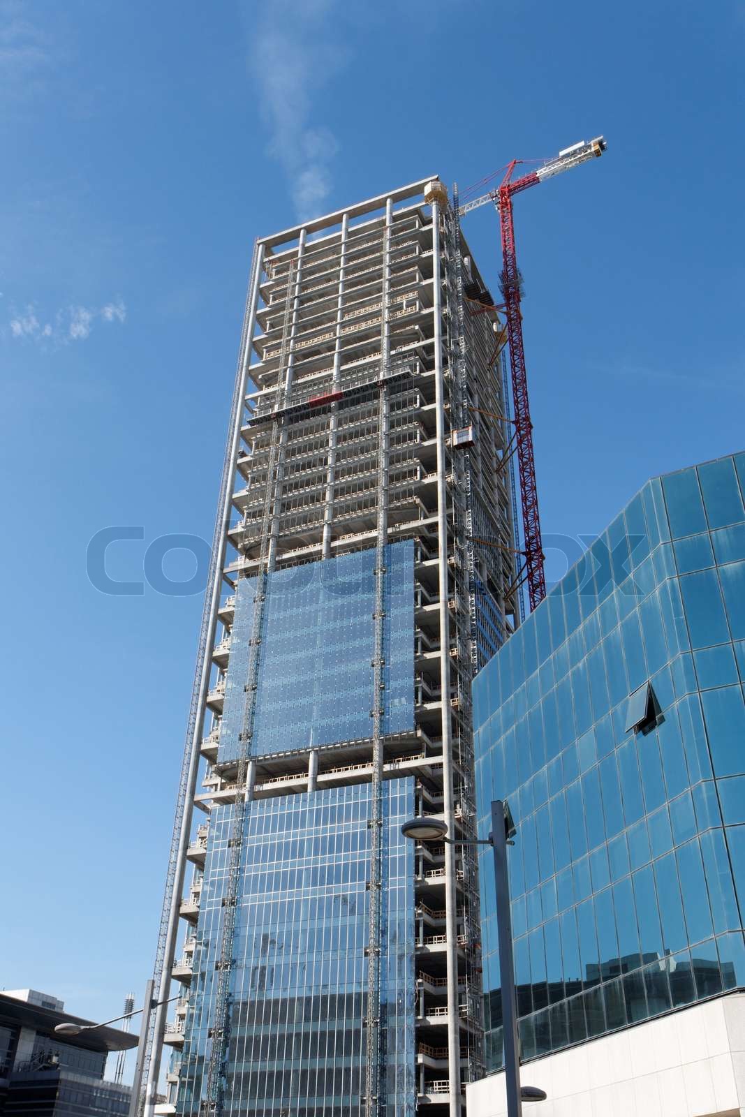 Lifting Crane At Skyscraper Construction Site Stock Image Colourbox