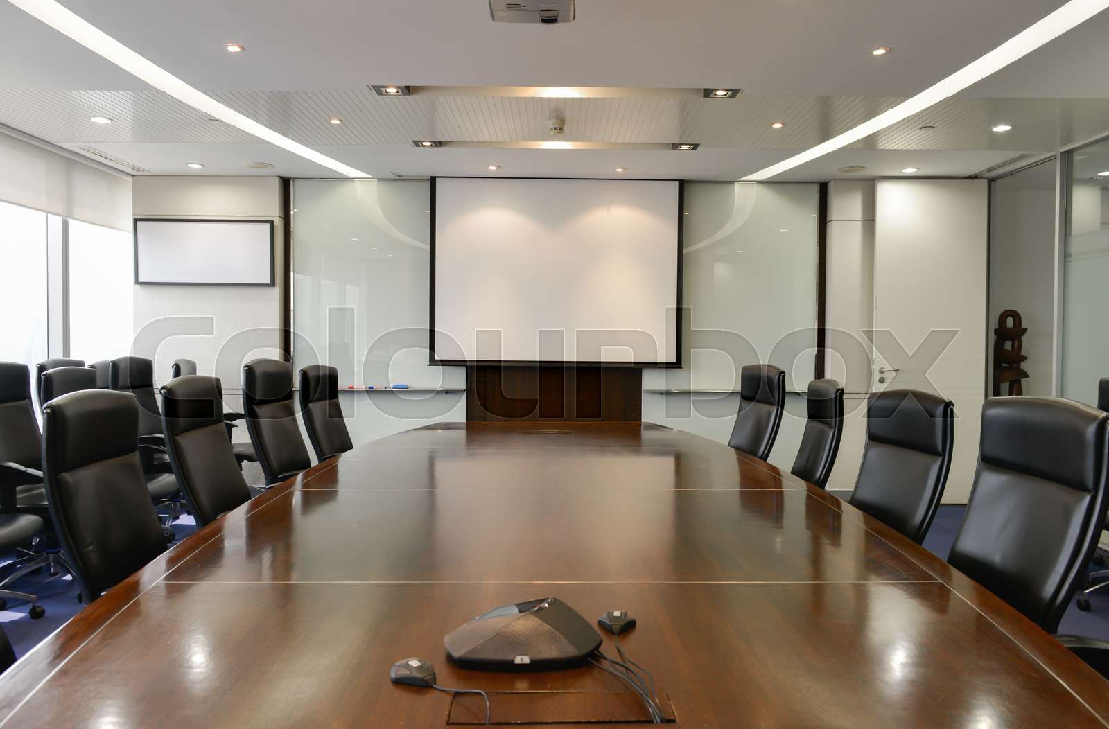 Business board room with white projector screen and IP Phone | Stock ...