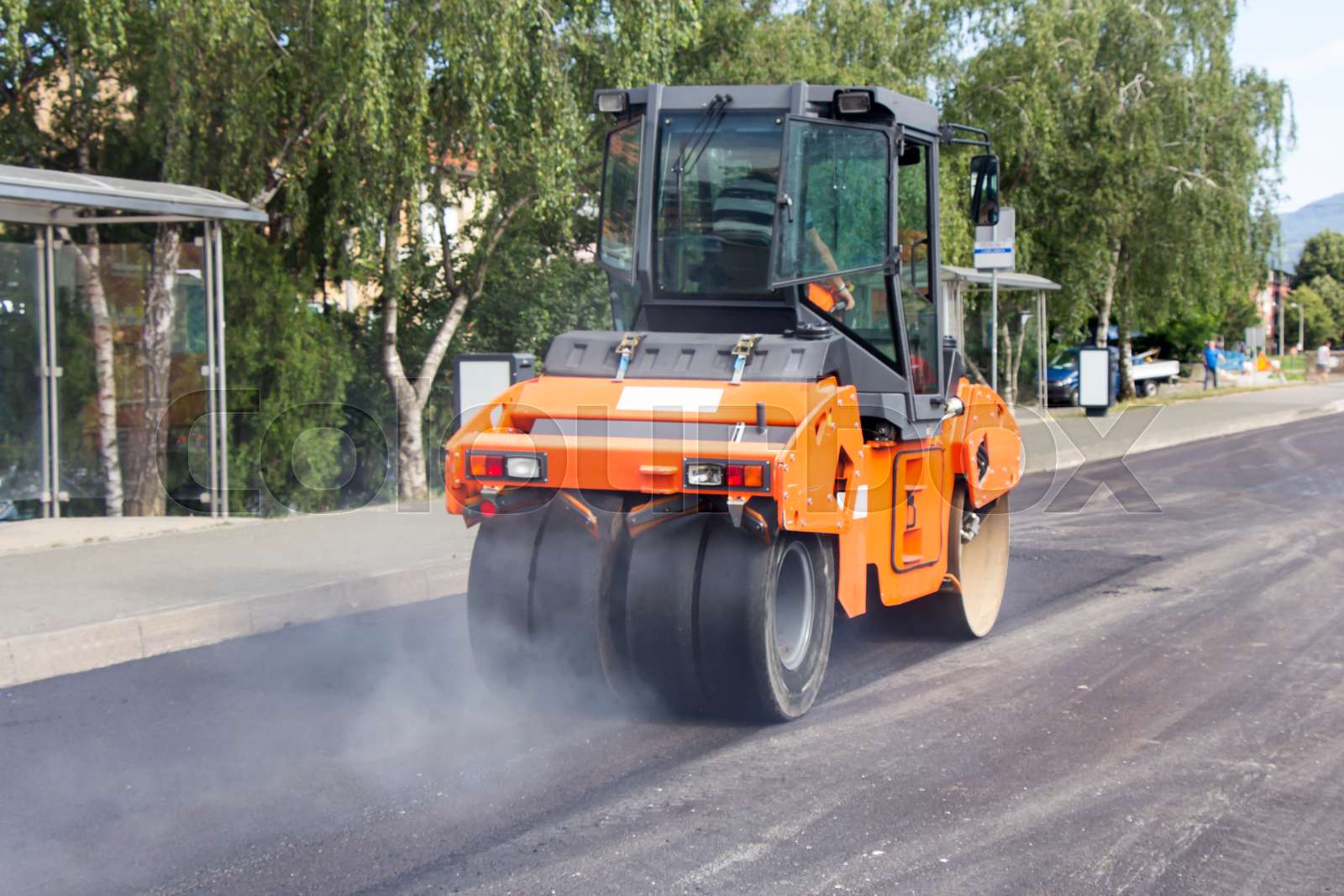 Roller, construction equipment, on the road repair site | Stock image ...