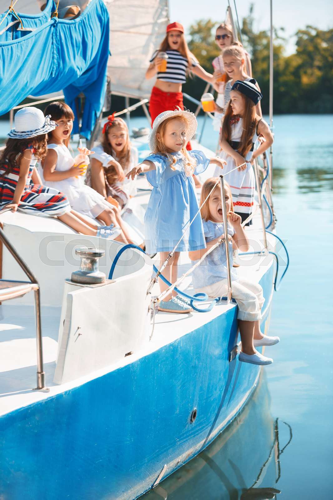 The children on board of sea yacht | Stock image | Colourbox