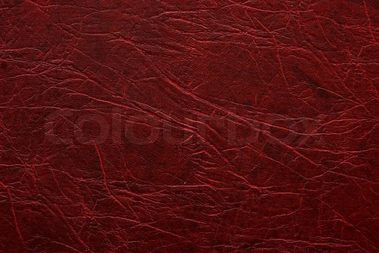 Die dunkelrote Struktur hat tiefe Risse gesetzt | Stock Bild | Colourbox