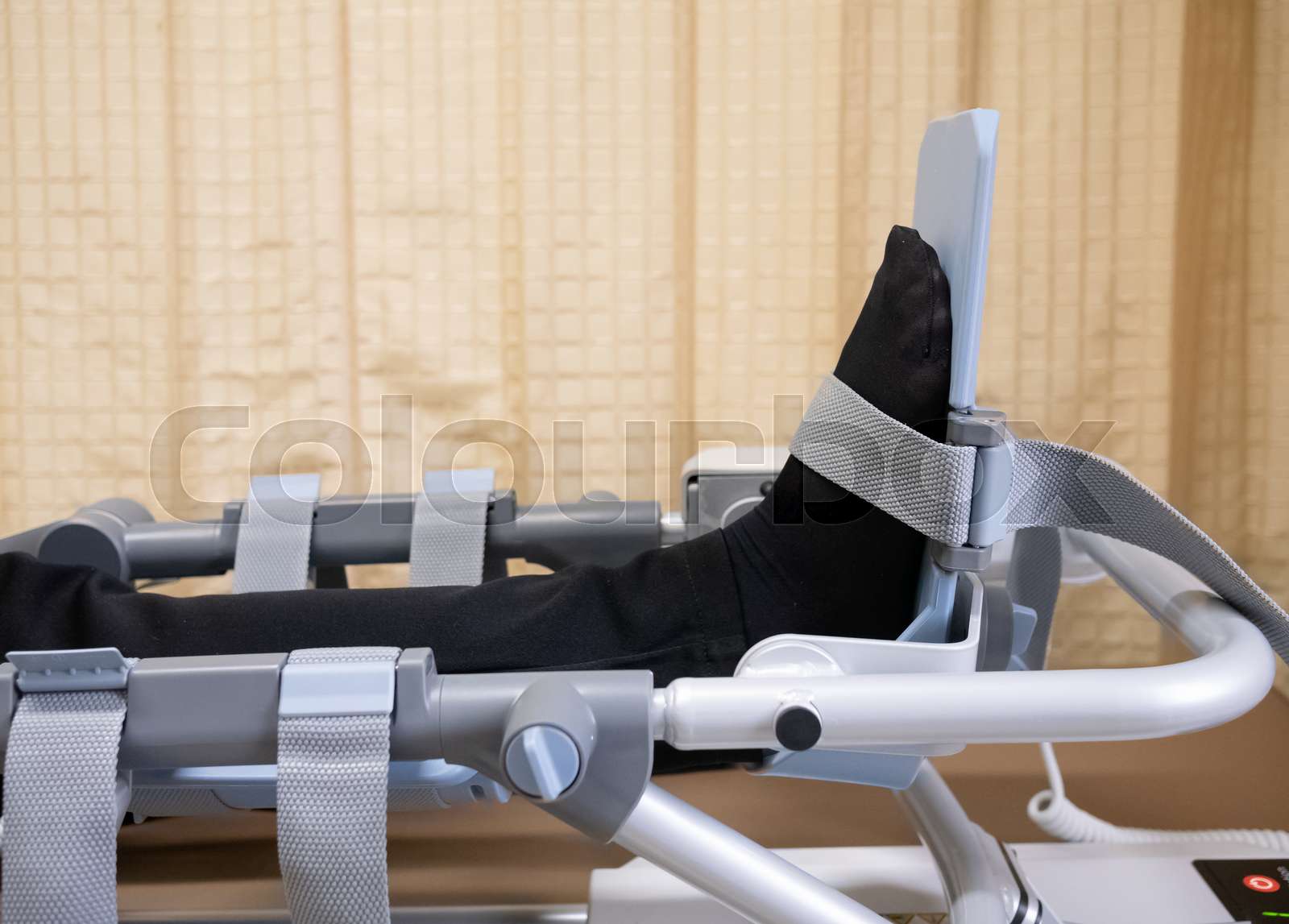 Ankle CPM device ,Rehabilitation after ankle surgery | Stock image ...