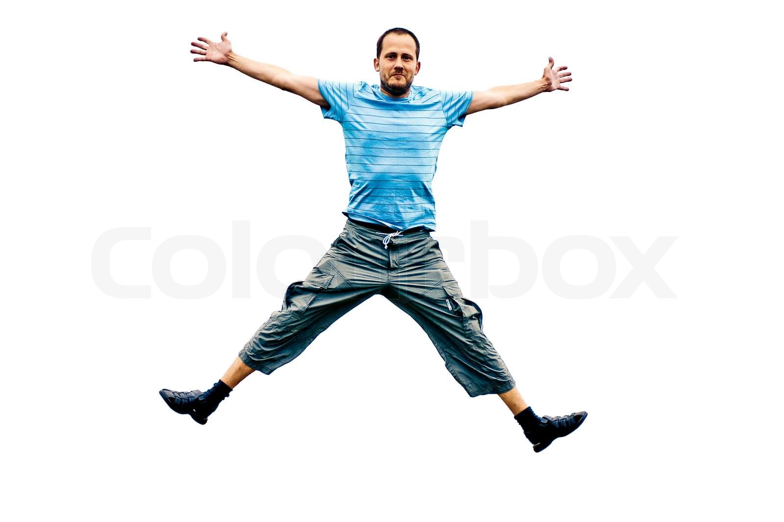 Glad mand hopper op i luften | Stock foto | Colourbox