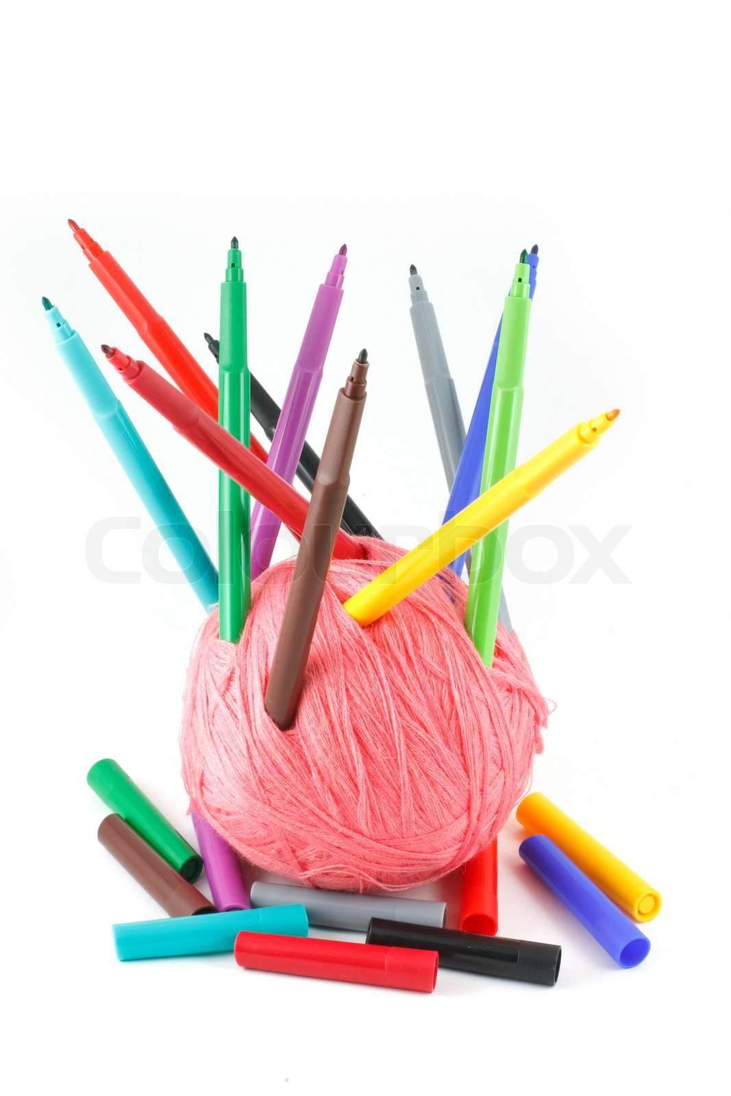 A bouquet of pens and a coil of thread | Stock image | Colourbox